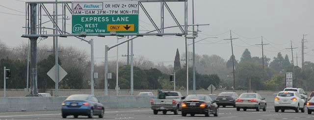 A highway sign which shows the Express Lane.